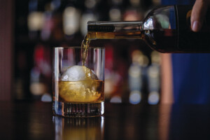 The Story Behind The Bourbon Whiskey Library - Charlotte Magazine