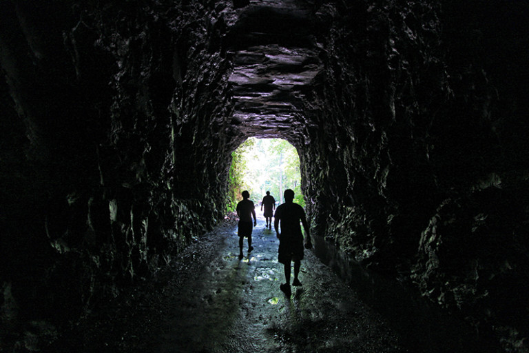 Walk Inside a Mountain at Stumphouse Tunnel - Charlotte Magazine