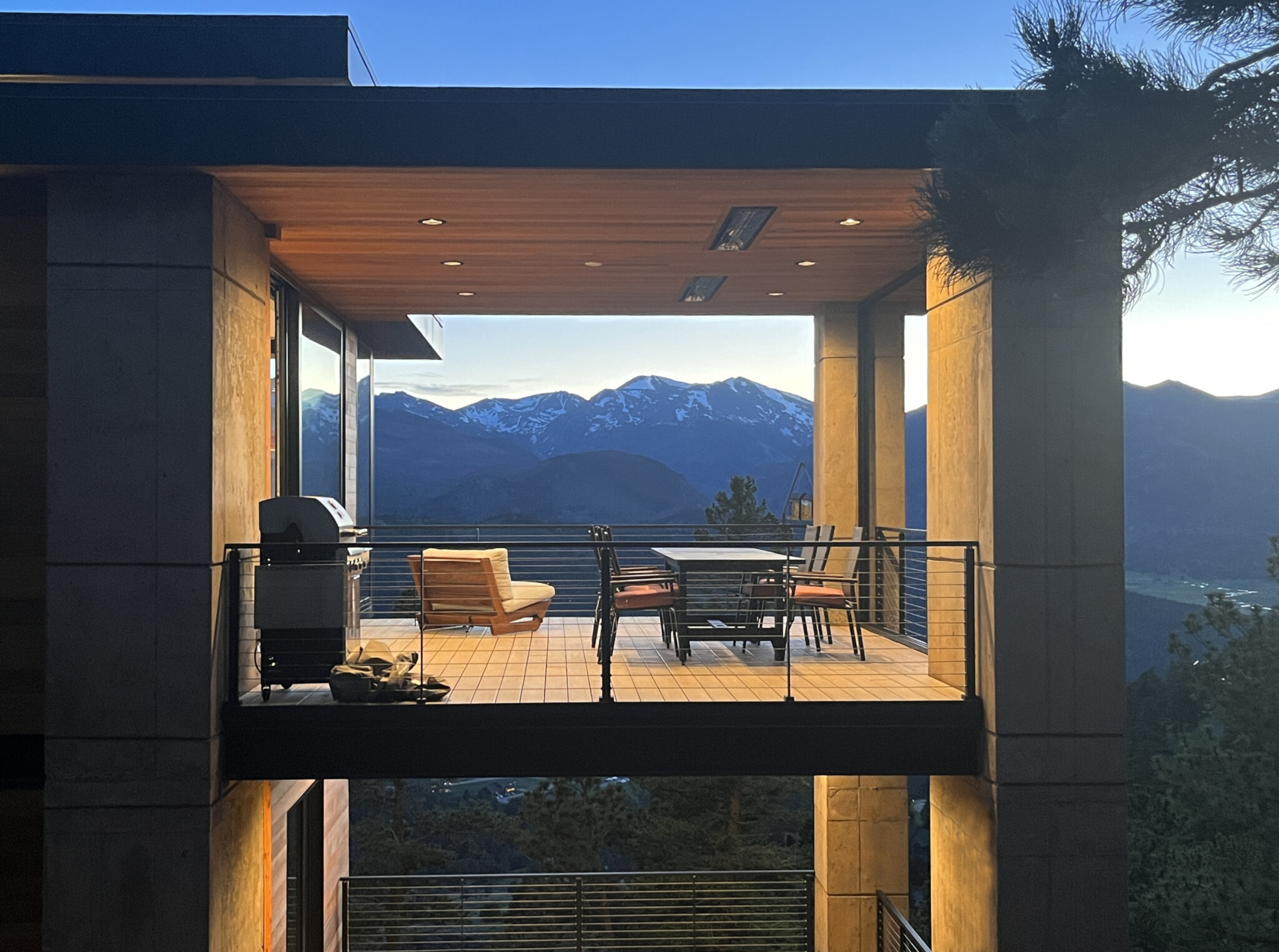 A Cliff Dwelling Home Overlooks the Expansive Views of Rocky Mountain ...