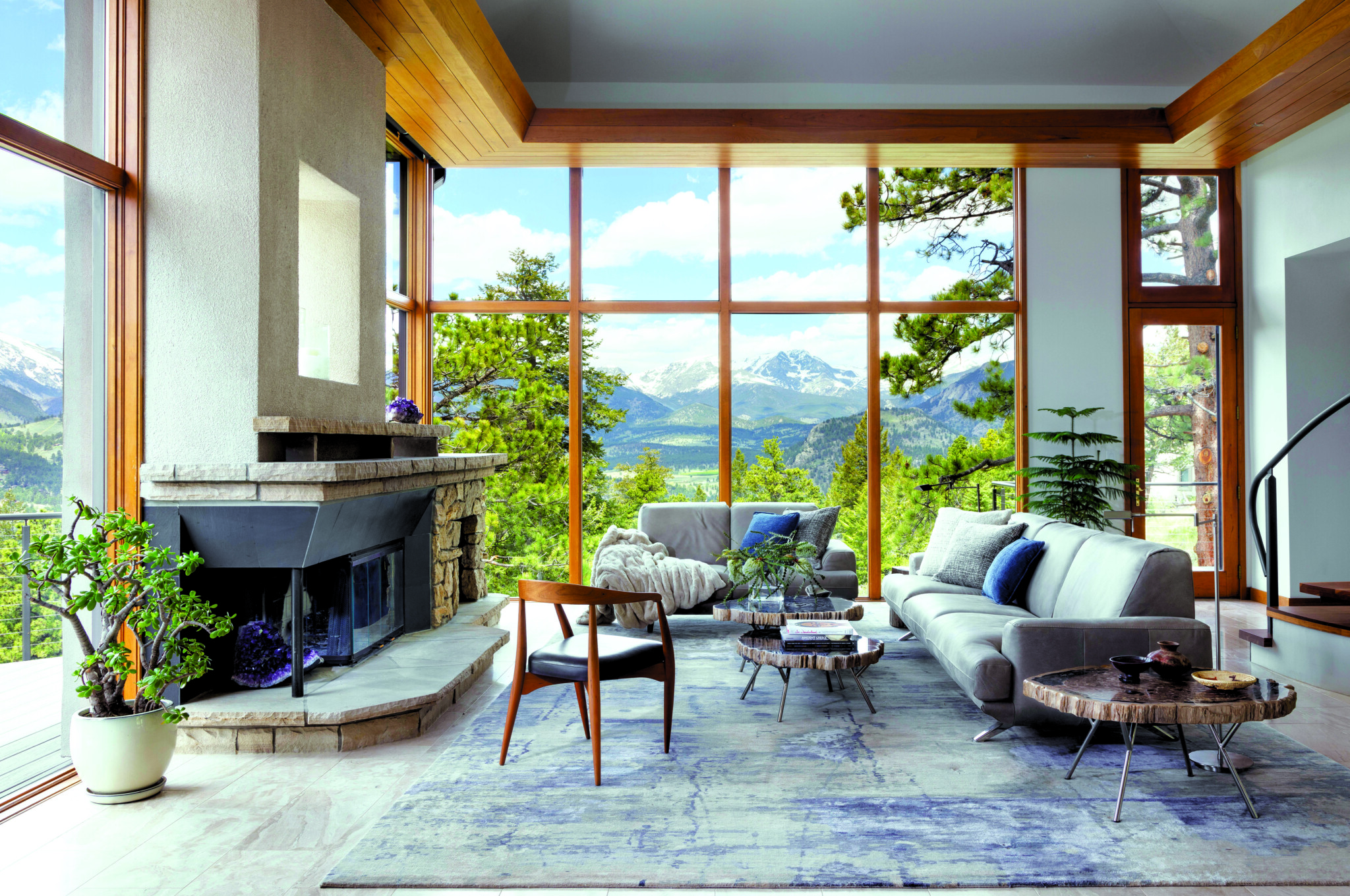 A Forever Home Set in Stone Overlooks the Grand Backdrop of Rocky ...