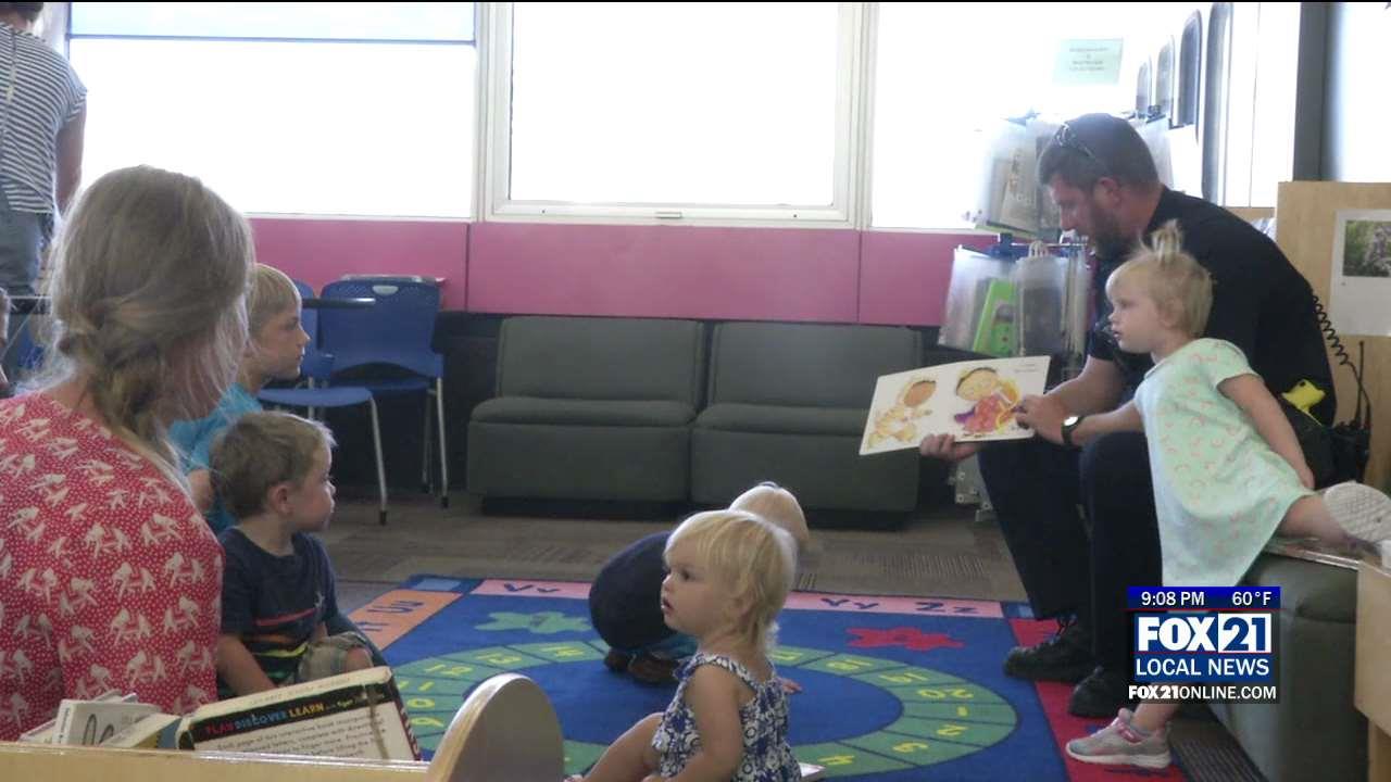 Squad Car Storytime Allows Kids to Bond with Police Officers - Fox21Online