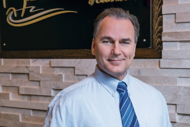 George J. Schmidt, D.M.D., FAGD