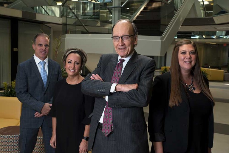 John E. Finnerty | Marilyn J. Canda | Amanda Ribustello | Laura Ortizo