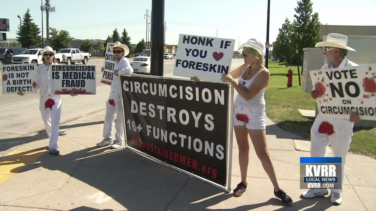 Circumcision Protesters on a Midwest Tour Line 13th Avenue in Fargo