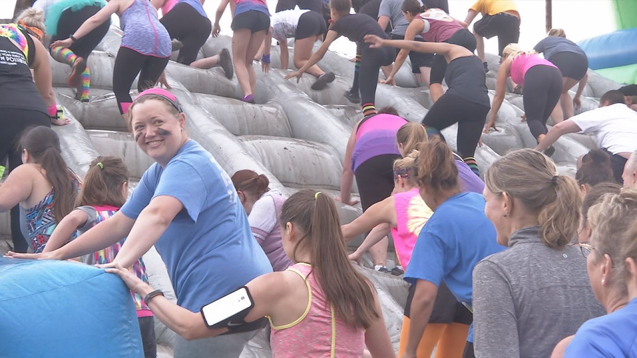 Runners Brave the Elements to Compete in "Insane Inflatable 5K"