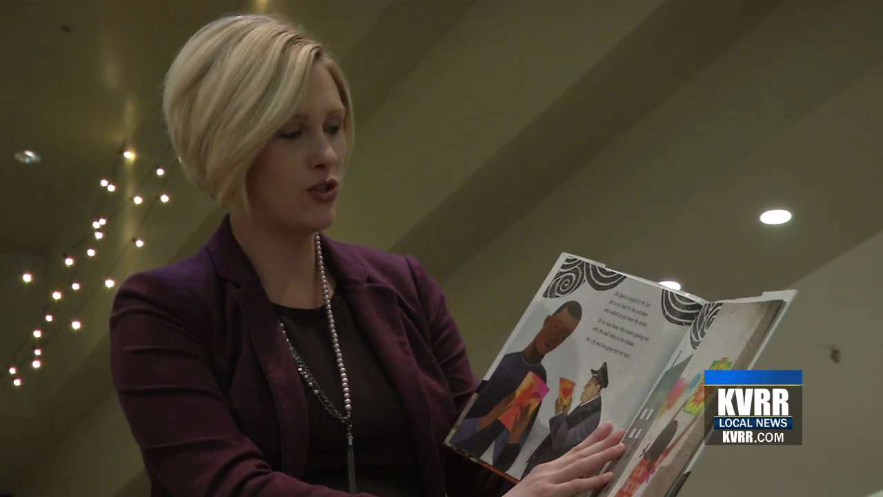 KVRR's TJ and Alison Read to Children for "Read for the Record" Annual ...