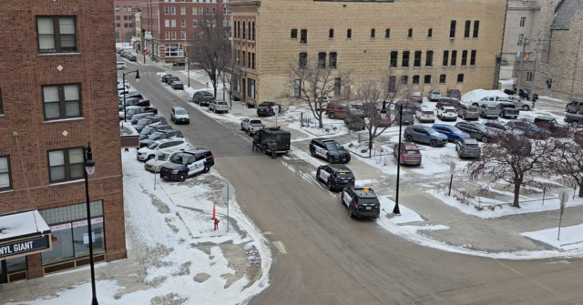 UPDATE: SWAT arrests man armed with a bat after standoff in downtown ...