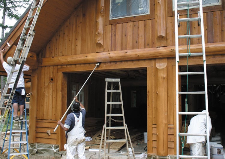 How to Stain and Maintain a Log or Timber Home - Mountain Living