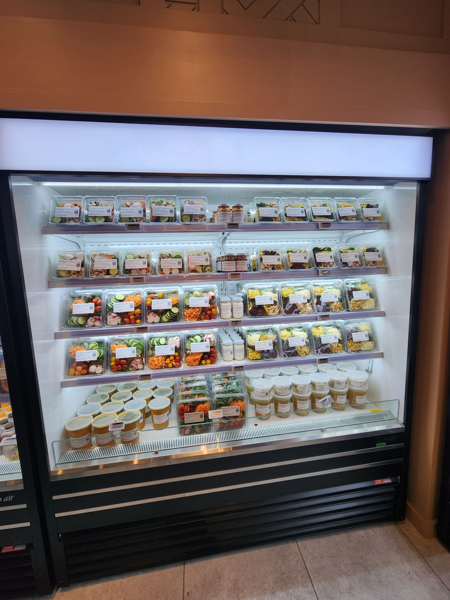 Feast & Fettle Opens its First Neighborhood Fridge Retail Market ...