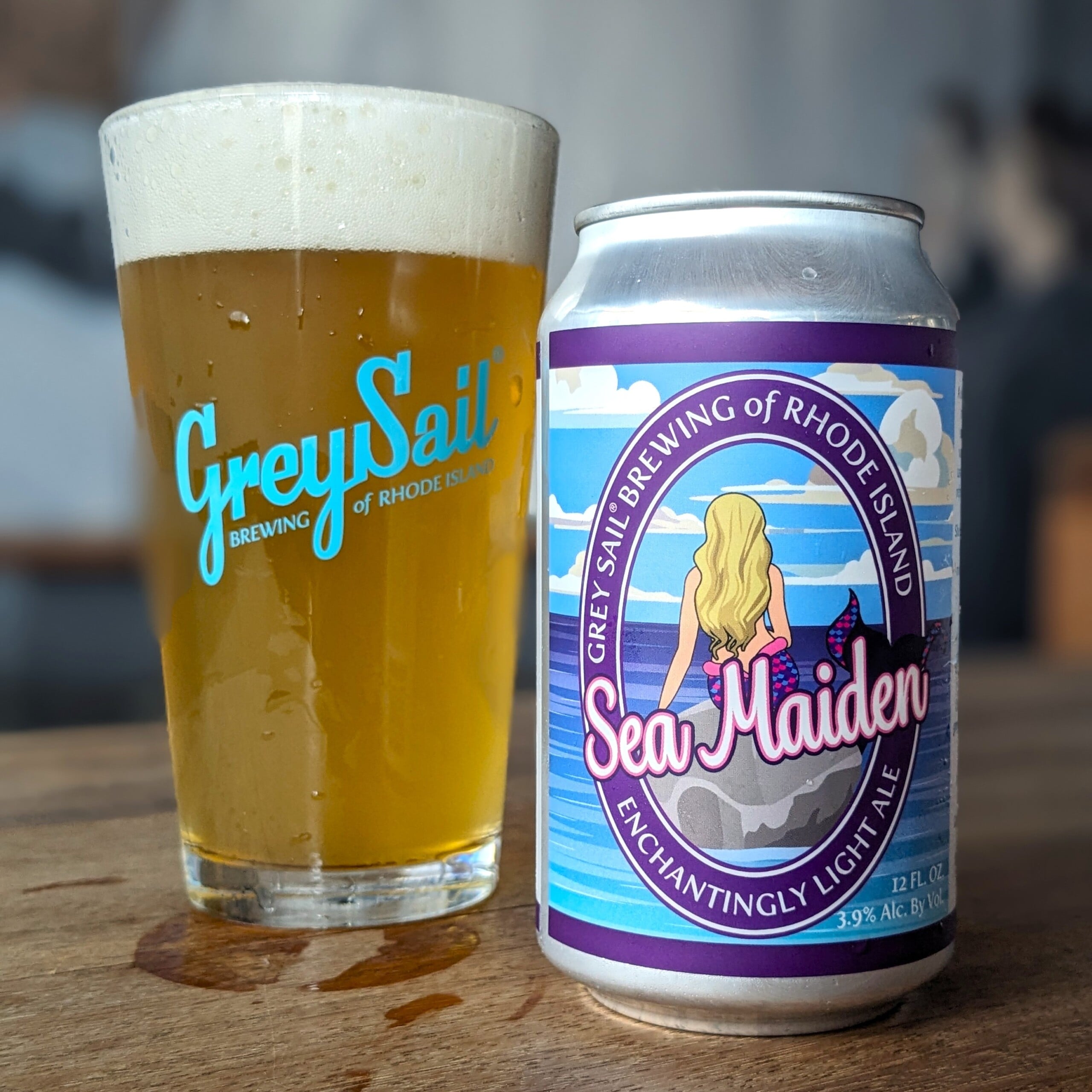 Sea Maiden with glass square - Rhode Island Monthly