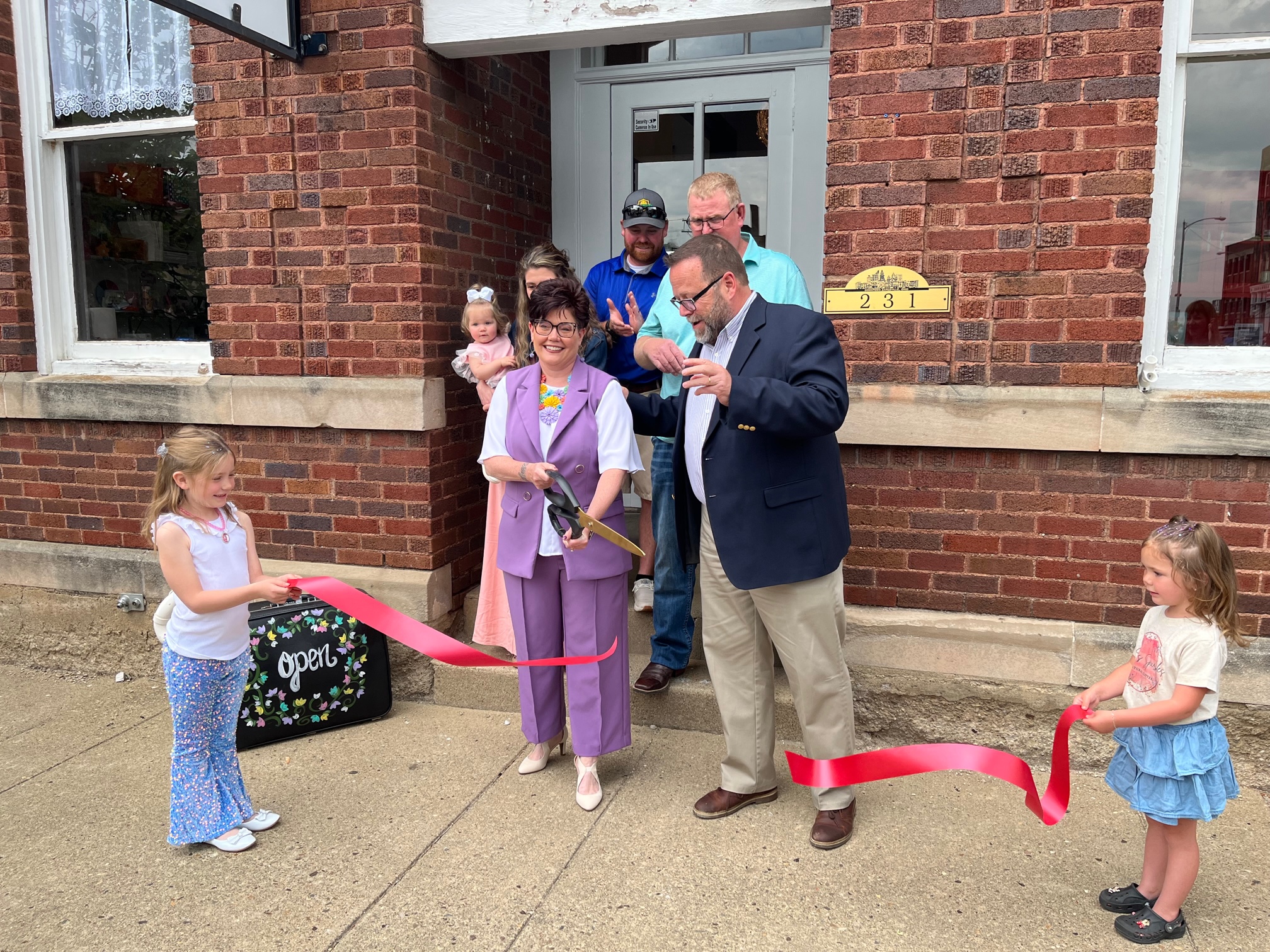 Vintage Charm & Glitter Host Ribbon Cutting Ceremony - WHIZ - Fox 5 ...